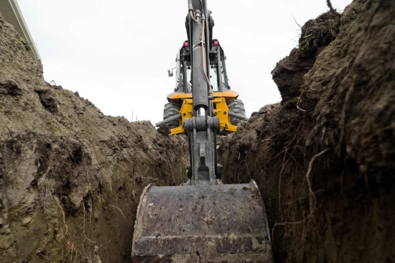Backhoe Excavation: How Deep Can You Dig Safely | Heavy Machinery World